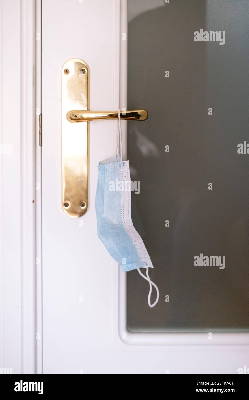Mask hanging on door hi-res stock photography and images - Alamy