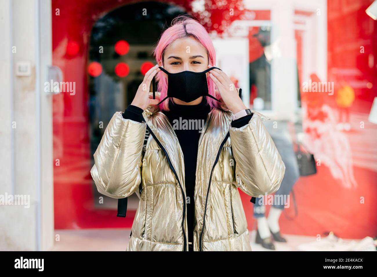 Fashionable women wearing face mask hi-res stock photography and images ...