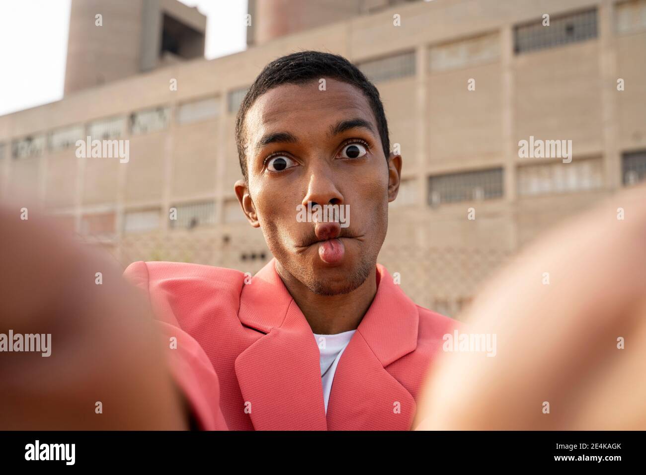 Young man making face hi-res stock photography and images - Alamy