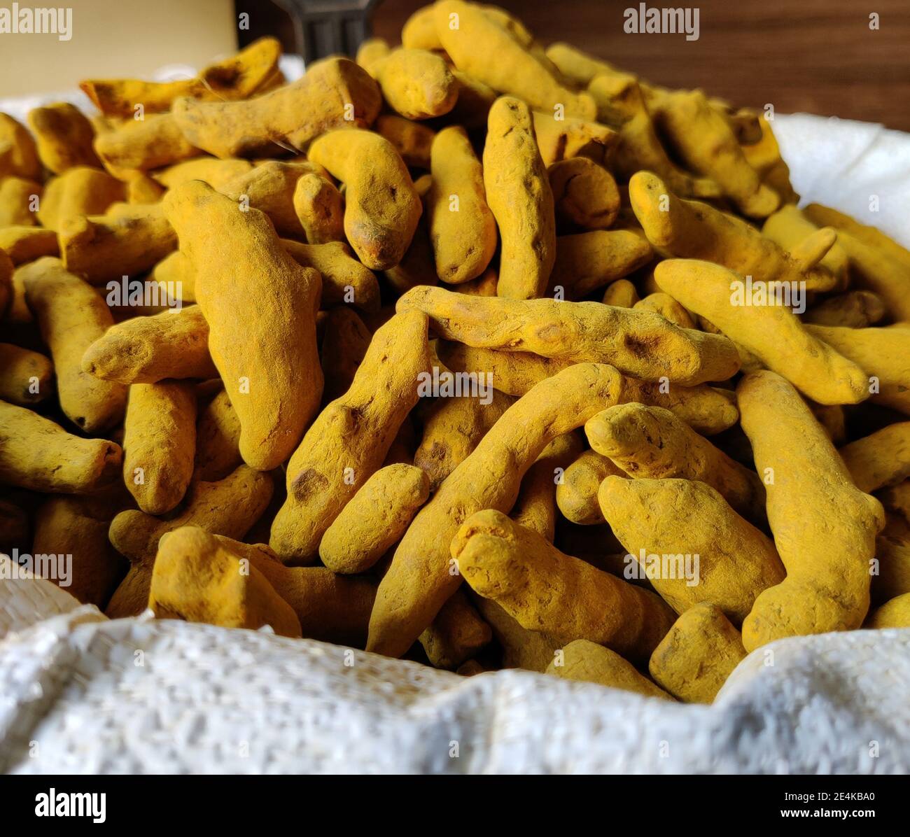 The Indian traditional raw turmeric sticks Stock Photo - Alamy