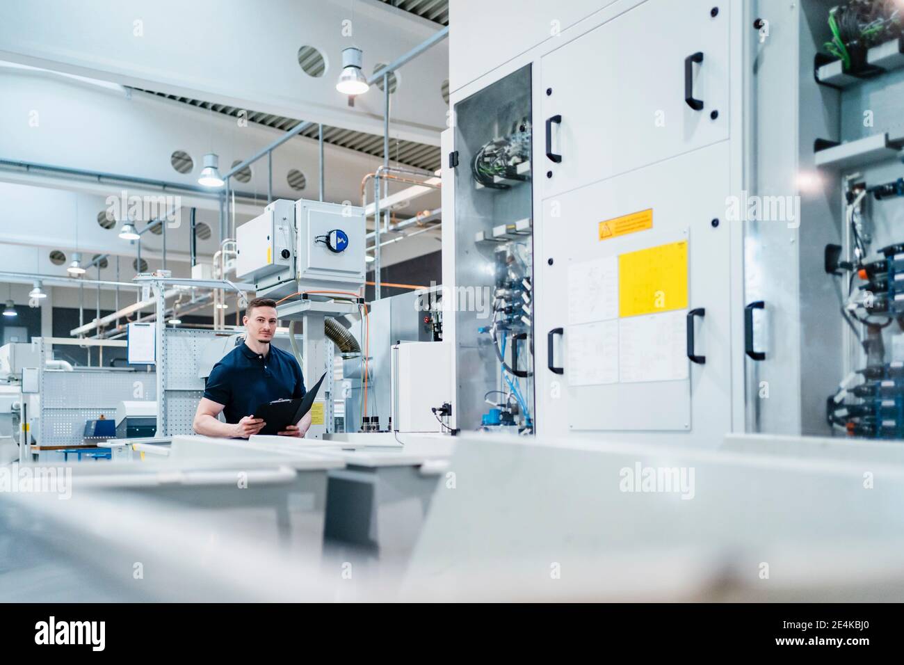 Man surrounded by paperwork hi-res stock photography and images - Alamy