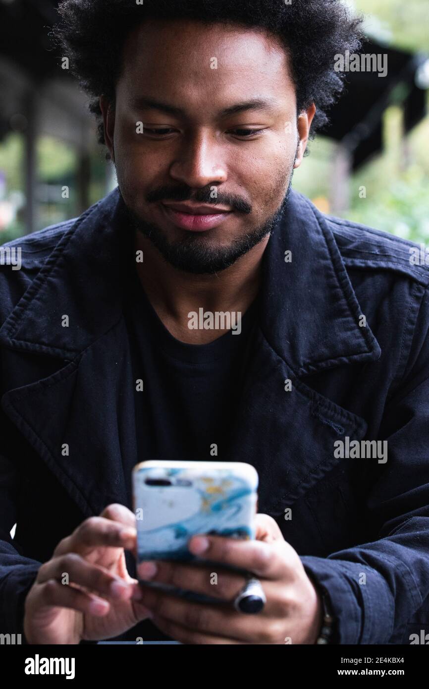 Front view handsome man using hi-res stock photography and images - Alamy