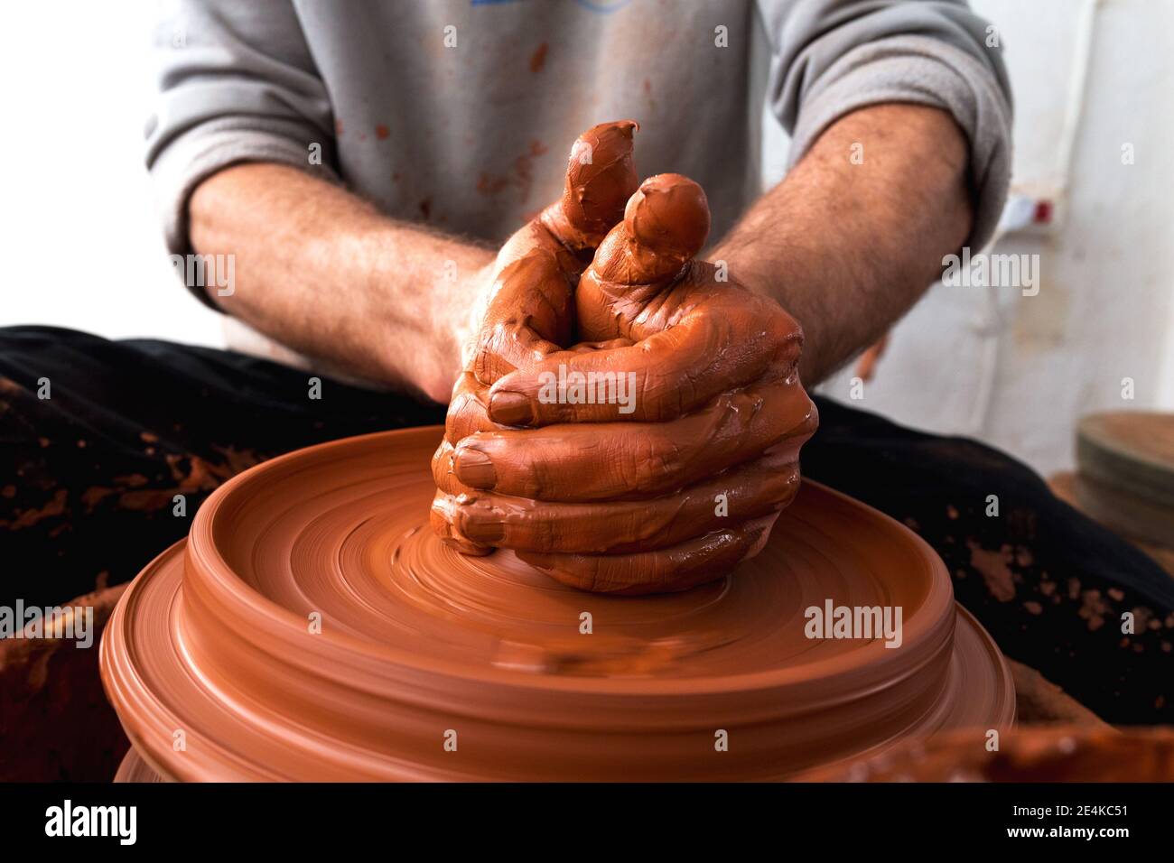Professional potter making bowl in pottery workshop, studio Stock Photo ...