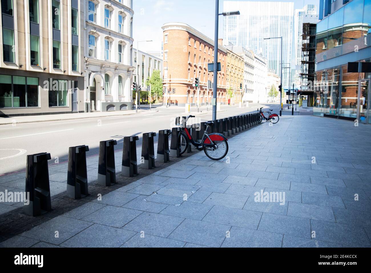UK, England, London, Bollards along empty street in middle of city ...