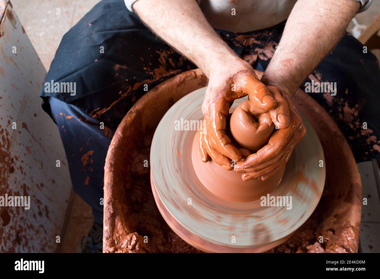 Professional potter making bowl in pottery workshop, studio Stock Photo ...