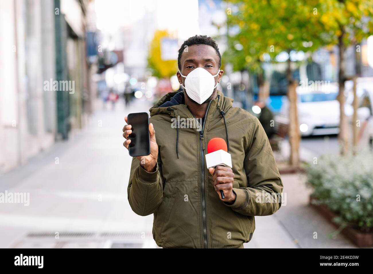 Standing journalist communication face to face holding hi-res stock ...