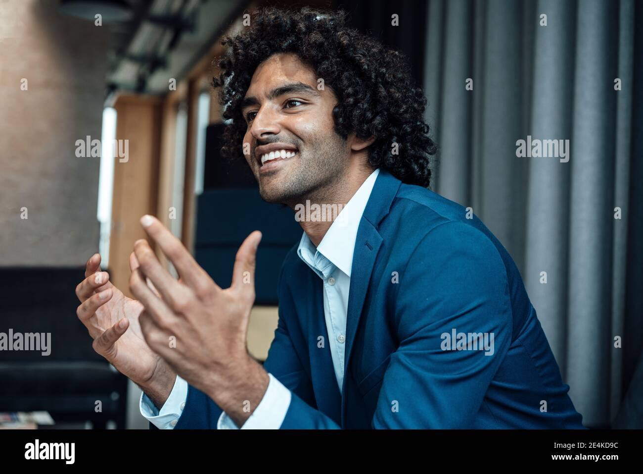 Gesturing communication looking away sitting hi-res stock photography ...