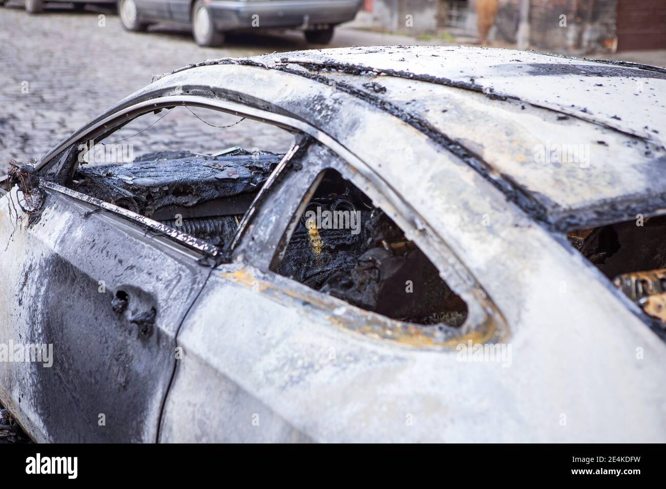 Burned car close-up. Car after the fire side view, crime of vandalism ...