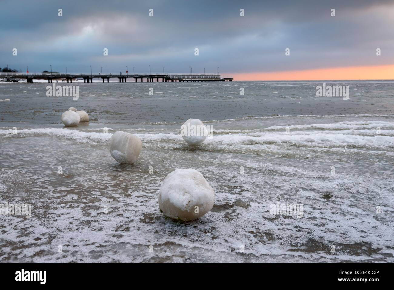 Frozen ice balls on the beach in Jastarnia during winter. Hel Peninsula ...