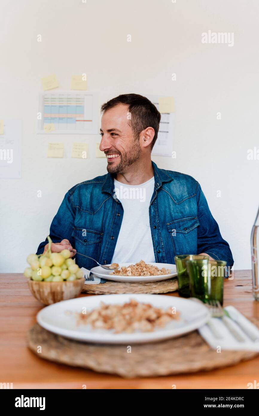 Food on plate in front of person hi-res stock photography and images ...