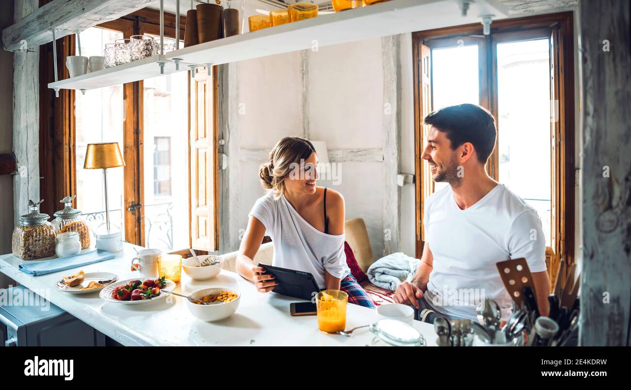 Happy couple home having breakfast hi-res stock photography and images ...