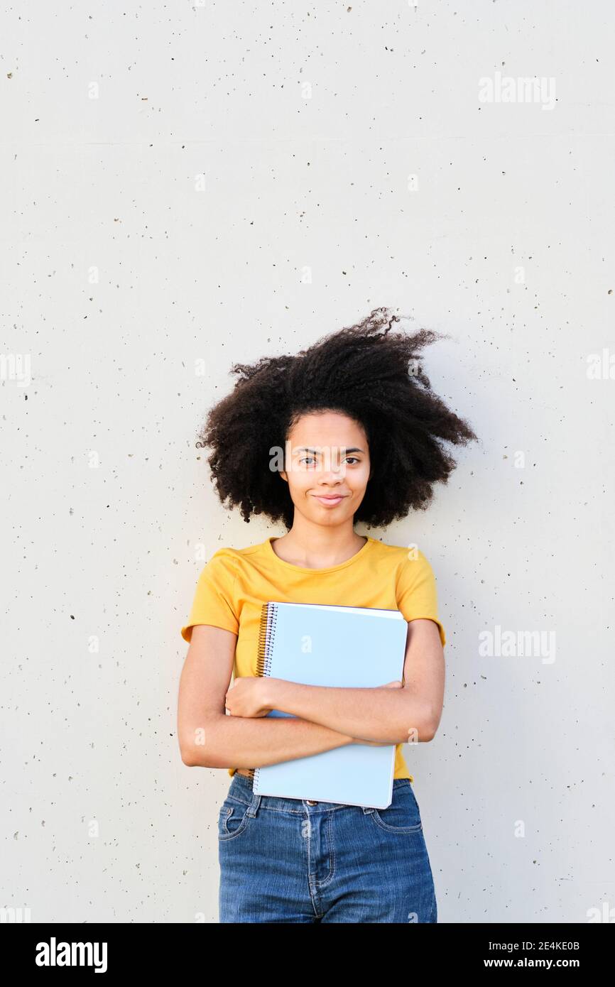 Smiling young beautiful student hi-res stock photography and images - Alamy