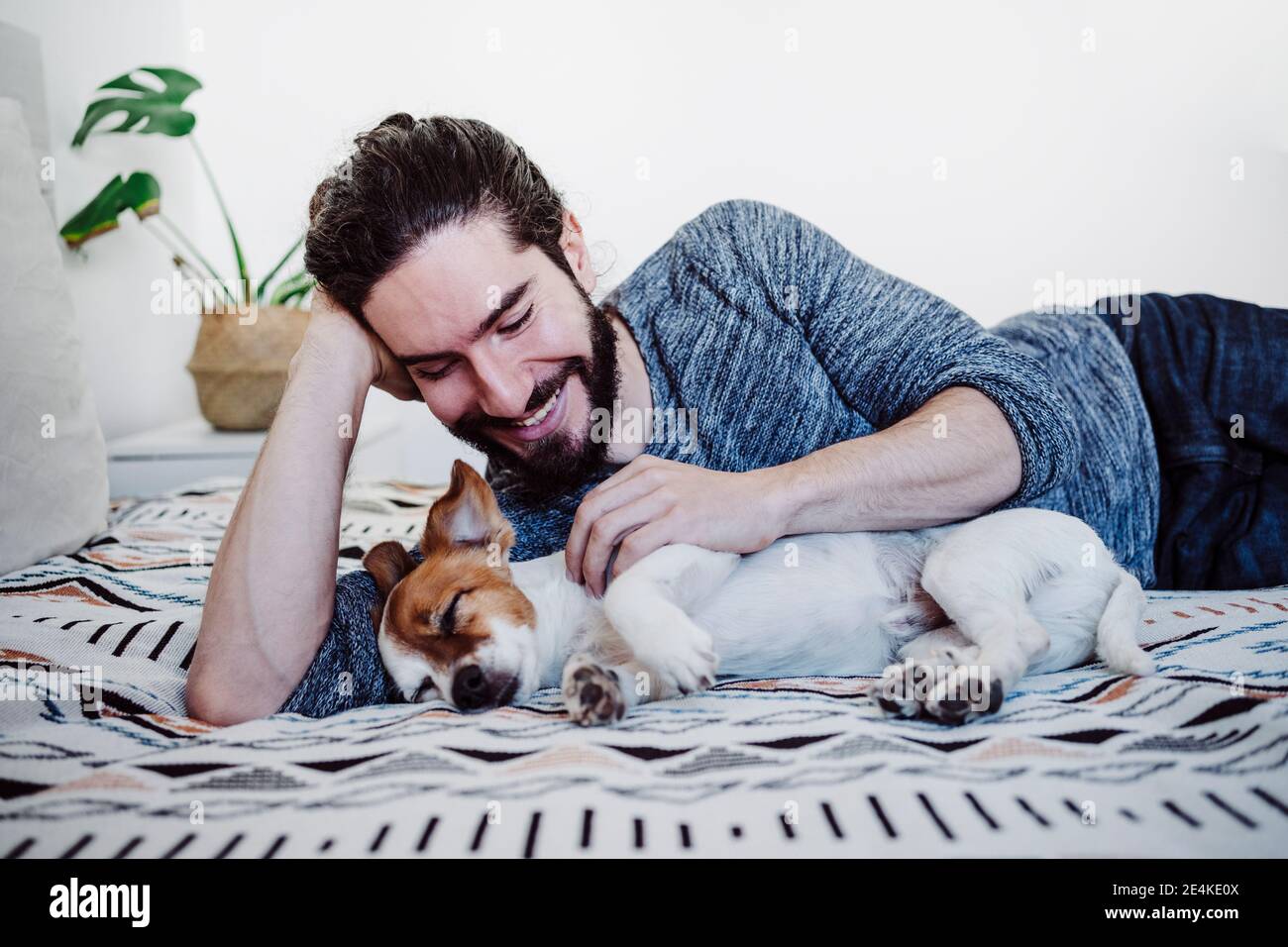 Man sleeping in dog bed hi-res stock photography and images - Alamy