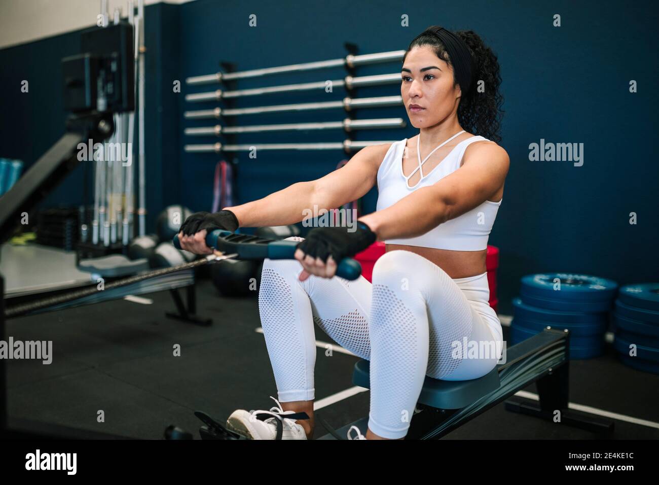 Female rowing machine gym hi-res stock photography and images - Alamy