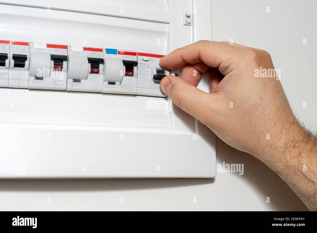 Electricity distribution box. Fuse box. man doing electrical work Stock ...