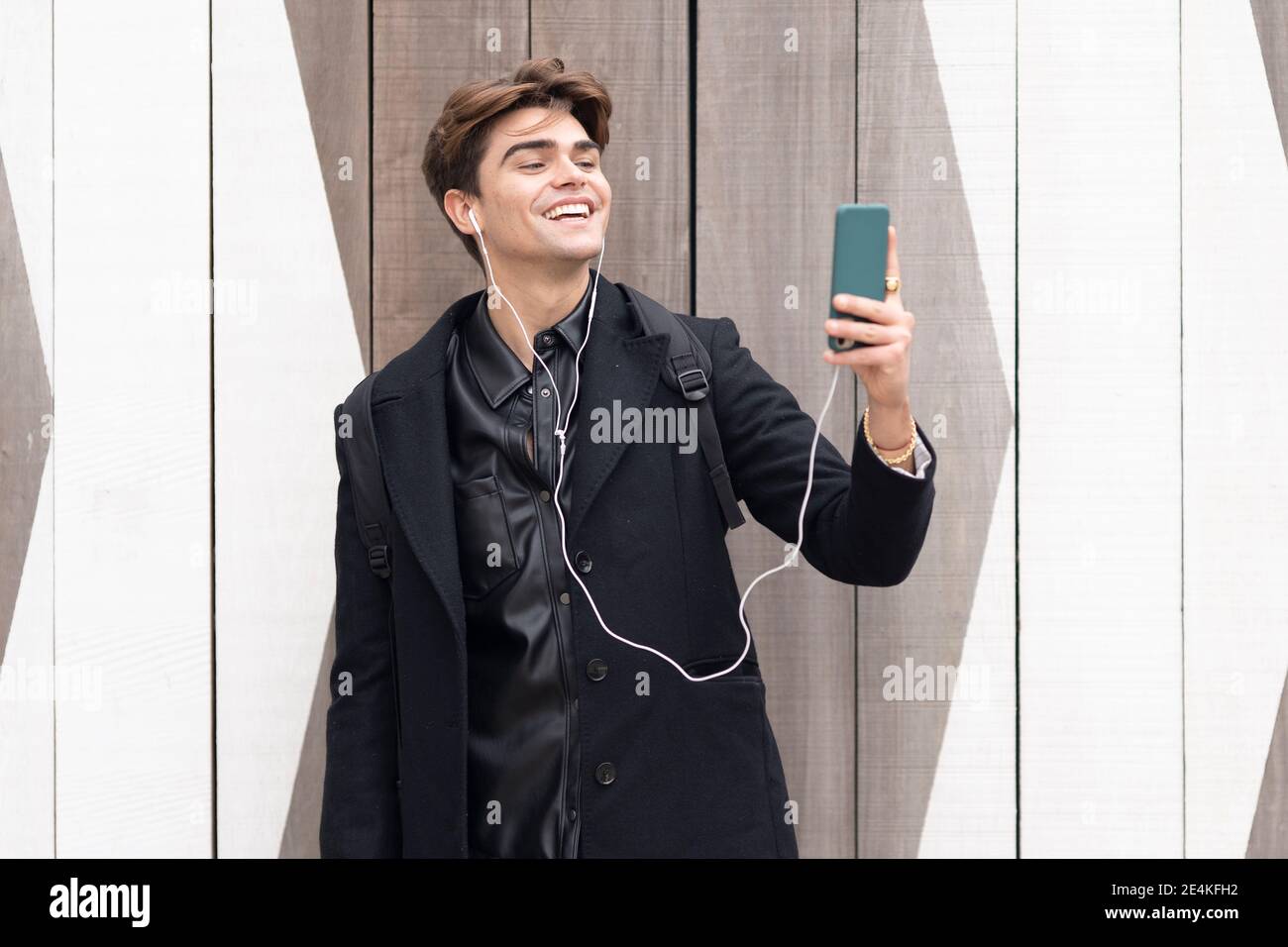 Young man smiling video conference hi-res stock photography and images ...