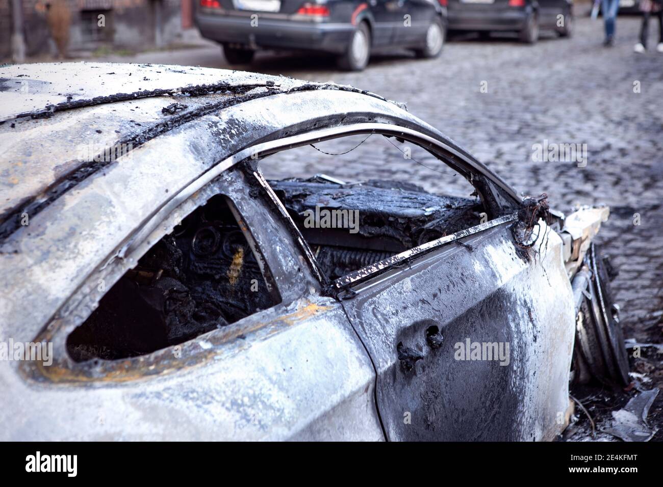 Burnt car close-up. Car after the fire, side view, crime of vandalism ...