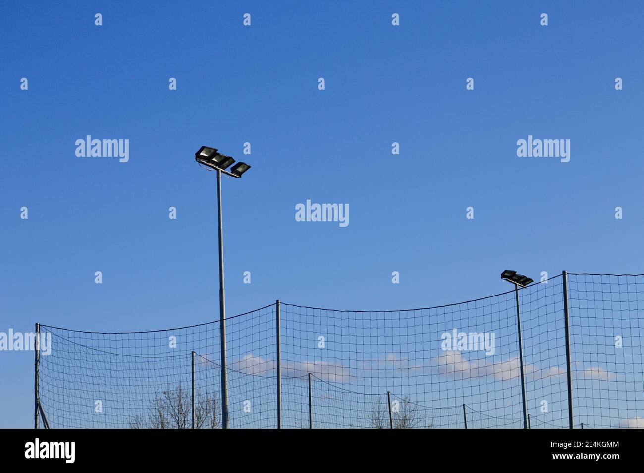 Stadium spotlight in a futsal field with a fence net (Pesaro, Italy ...