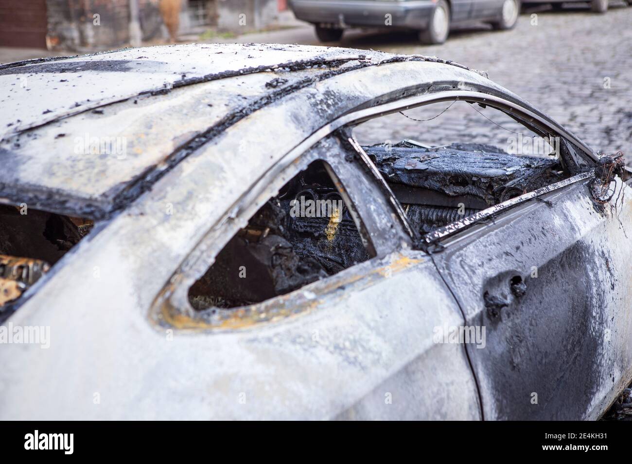 Burnt car close-up. Car after the fire, side view, crime of vandalism ...