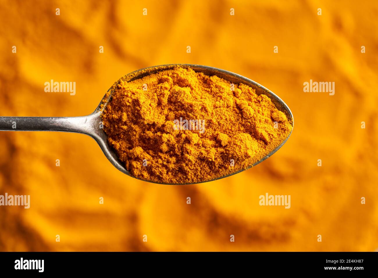 Ground turmeric root, top view Stock Photo - Alamy