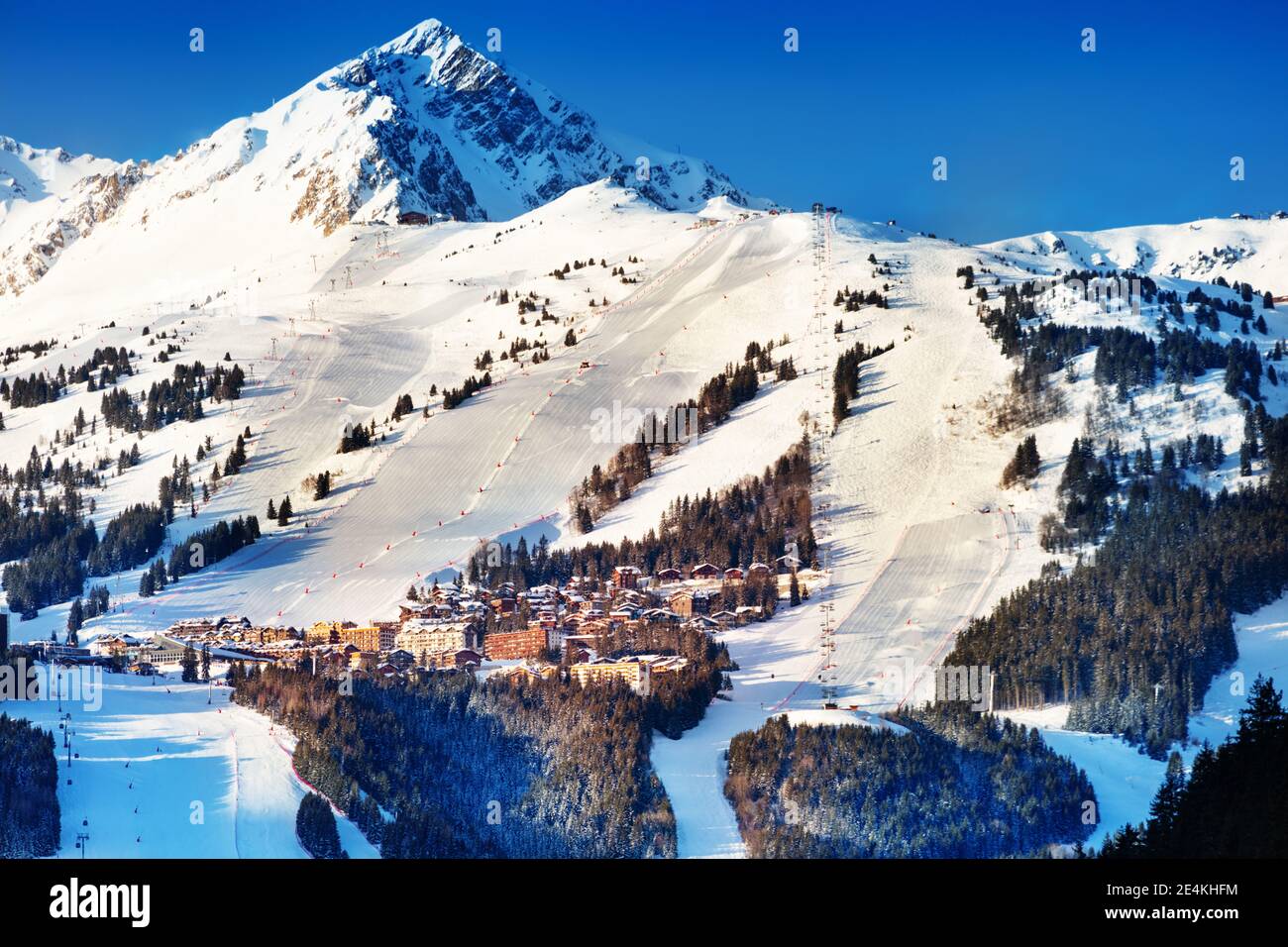 French Courchevel ski resort slopes village, valley of Alps mountain ...