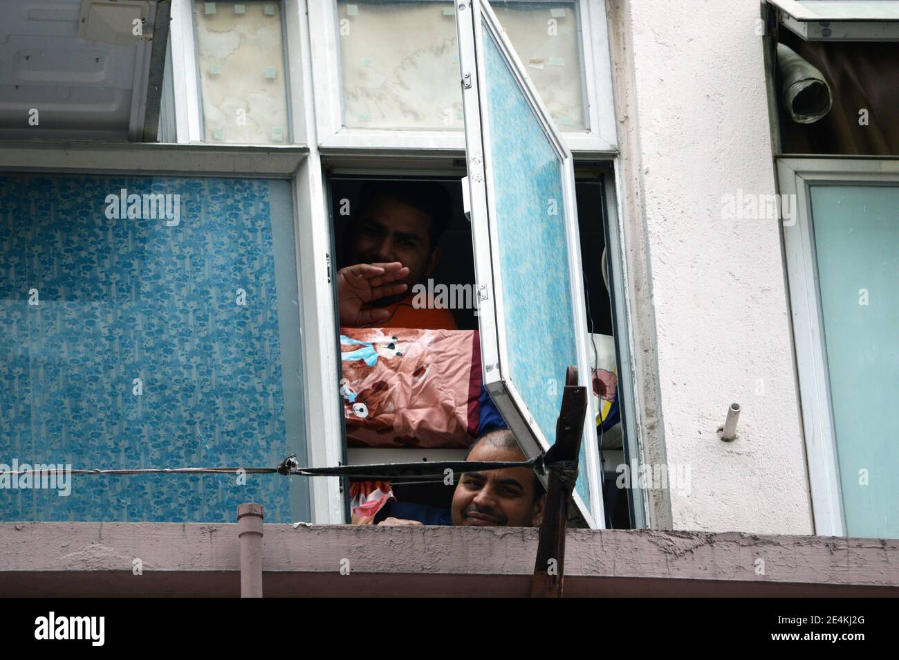 Men trapped inside lockdown area of Yau Ma Tei, Hong Kong during Covid ...