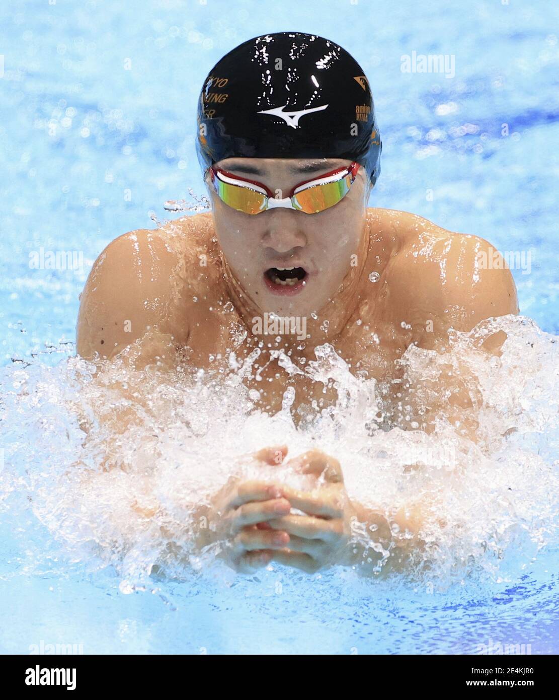 Shoma Sato swims en route to winning the men's 200-meter breaststroke final at the Kosuke ...