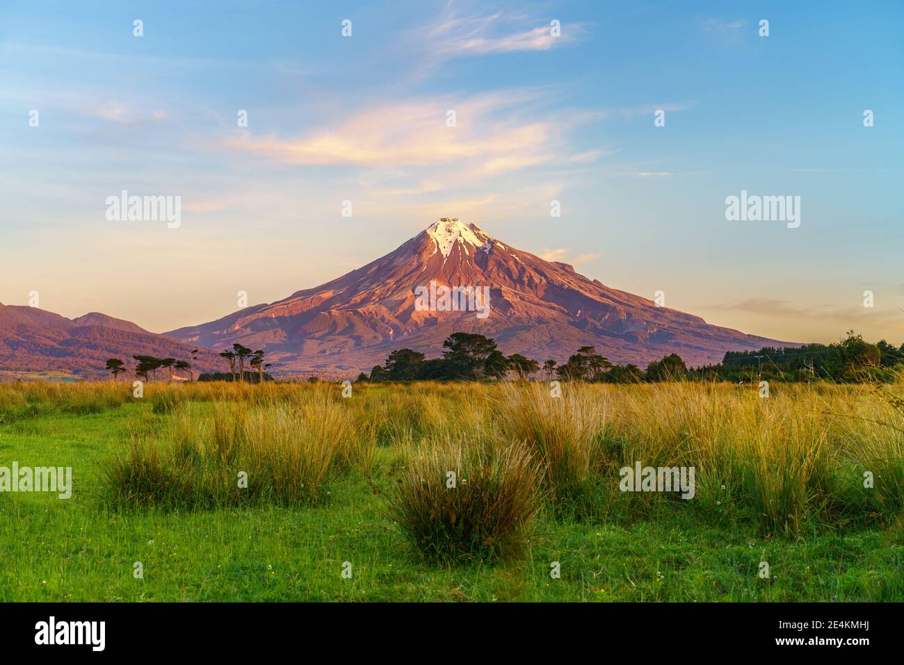 sunset at cone volcano mount taranaki in new zealand Stock Photo - Alamy