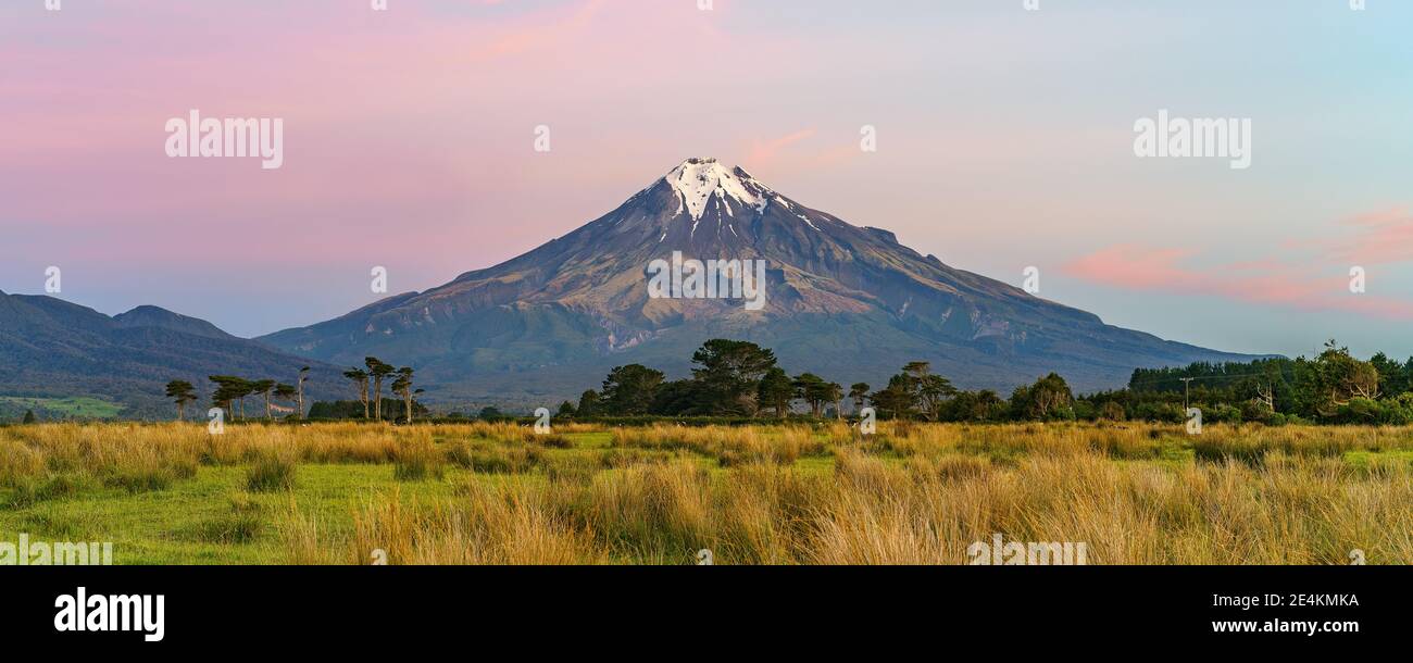 sunset at cone volcano mount taranaki in new zealand Stock Photo - Alamy