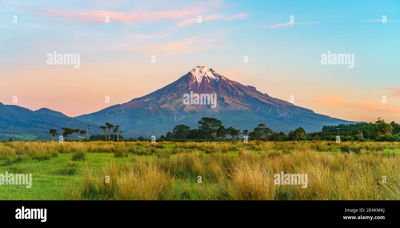 sunset at cone volcano mount taranaki in new zealand Stock Photo - Alamy