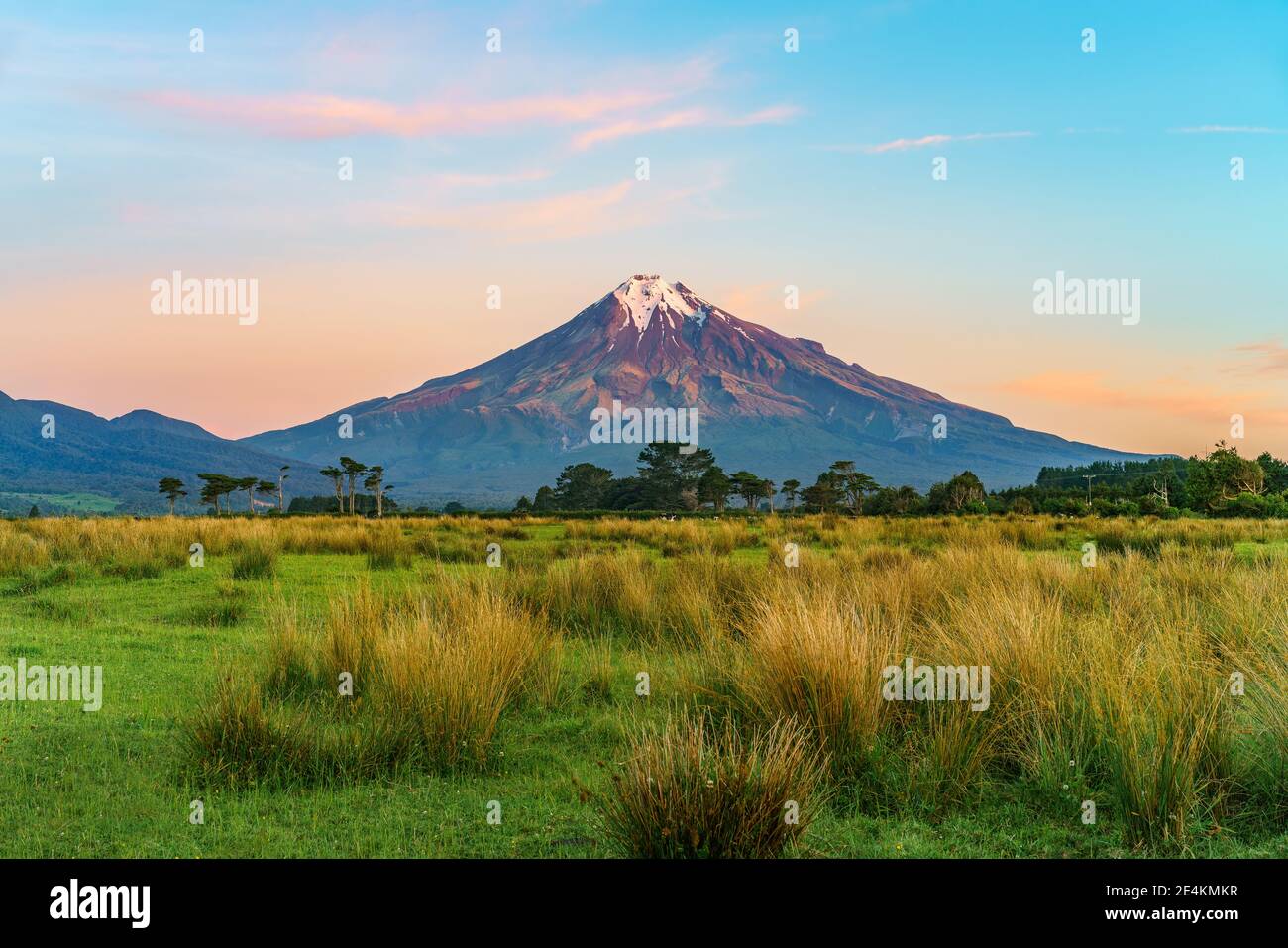 sunset at cone volcano mount taranaki in new zealand Stock Photo - Alamy
