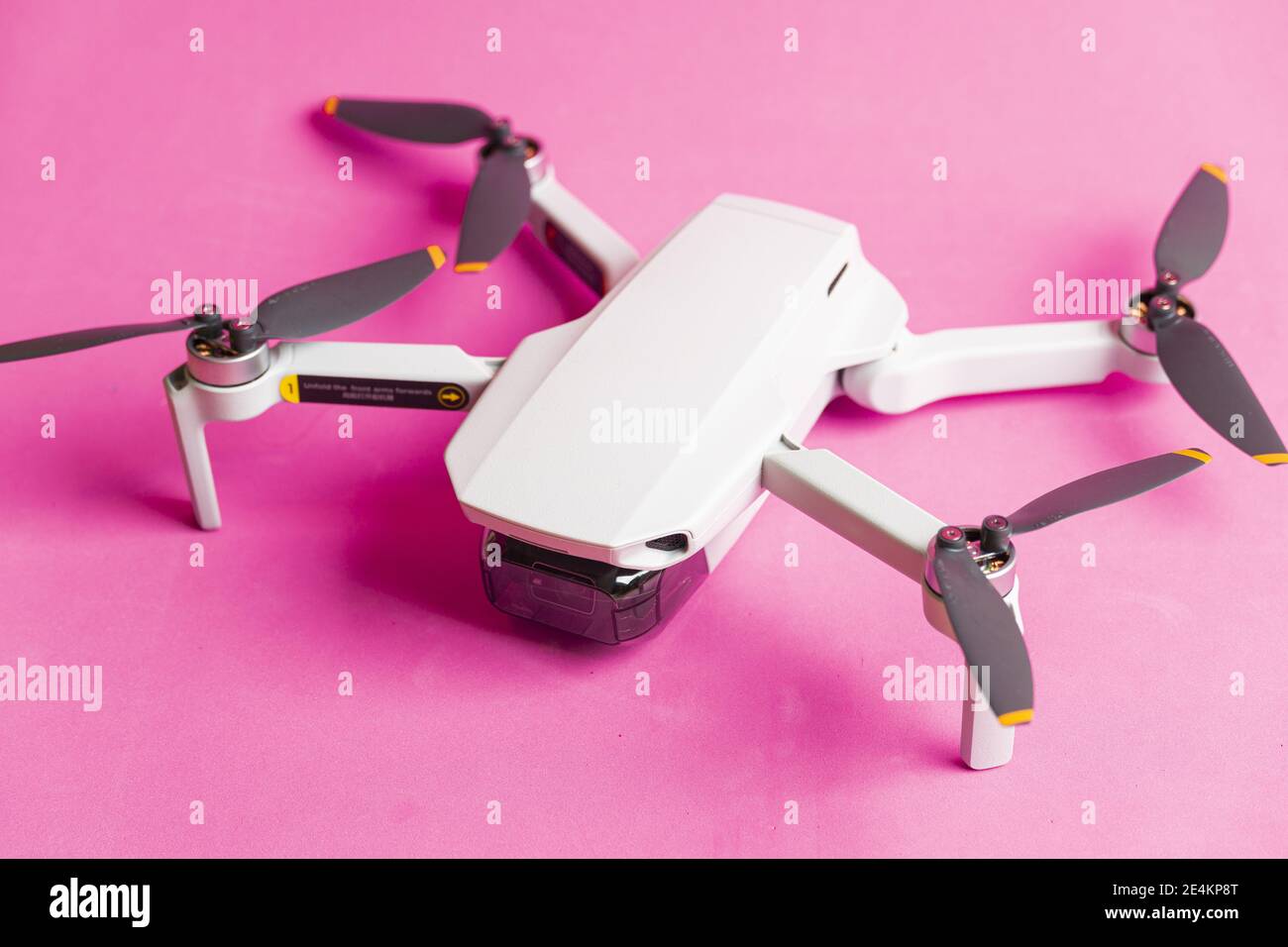 drone on flat pink background. concept photography or video with drone ...