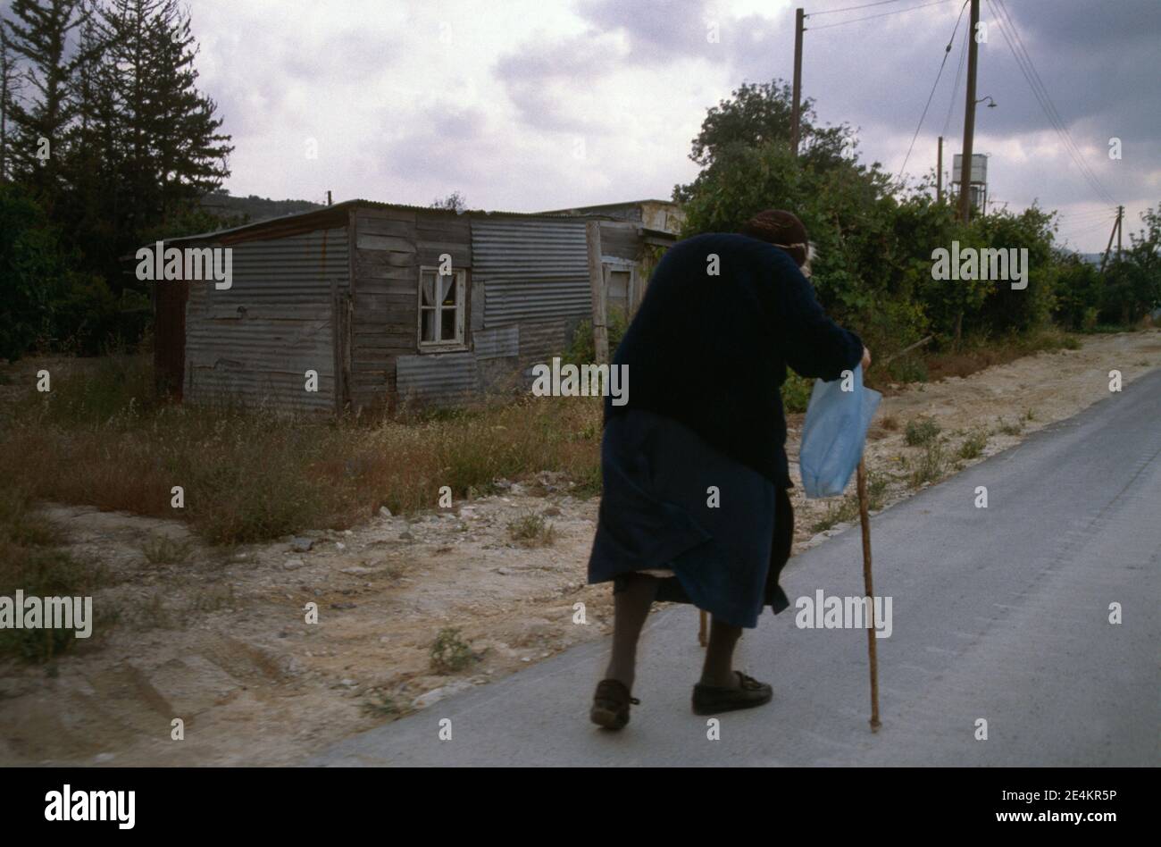 Elderly woman using walking stick hi-res stock photography and images ...