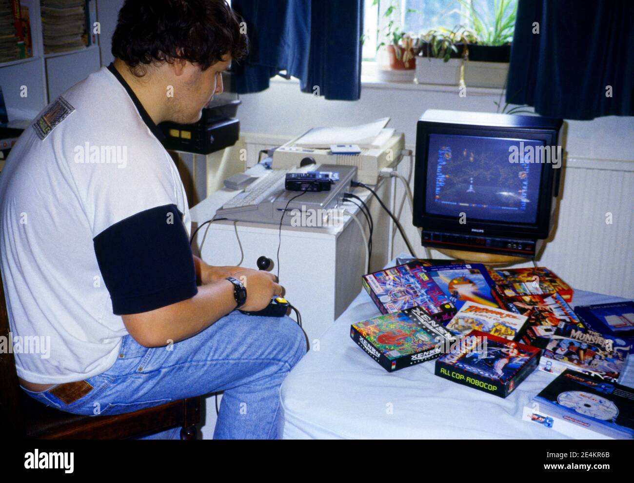 Teenage Boy Playing Computer Games Stock Photo - Alamy