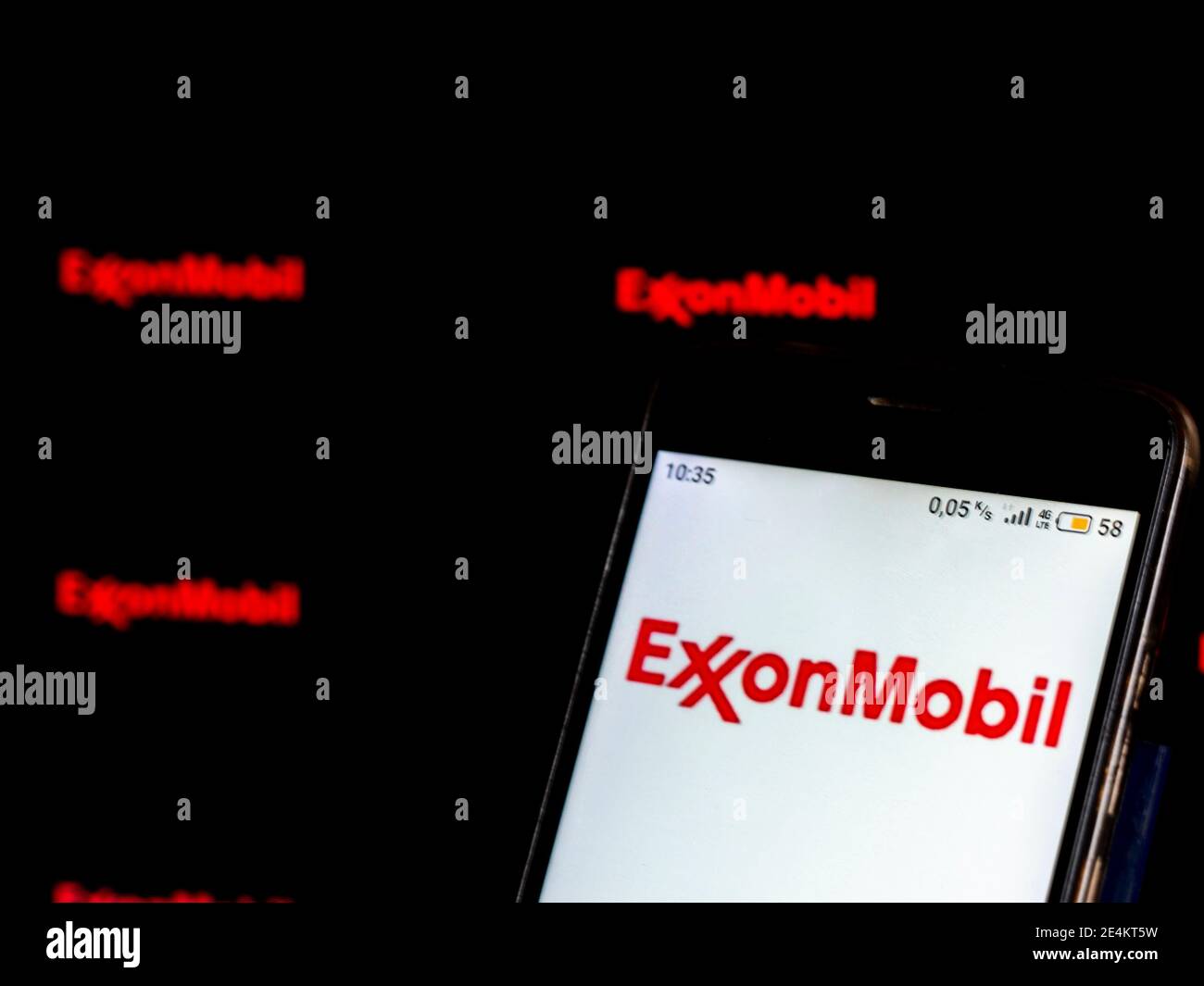 In this photo illustration, an ExxonMobil logo seen displayed on ...