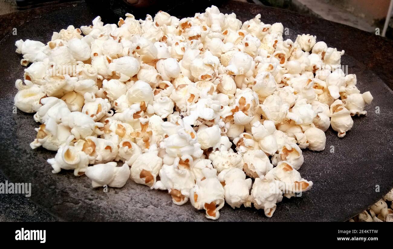 Popcorn heap close-up in a public market in india Stock Photo - Alamy