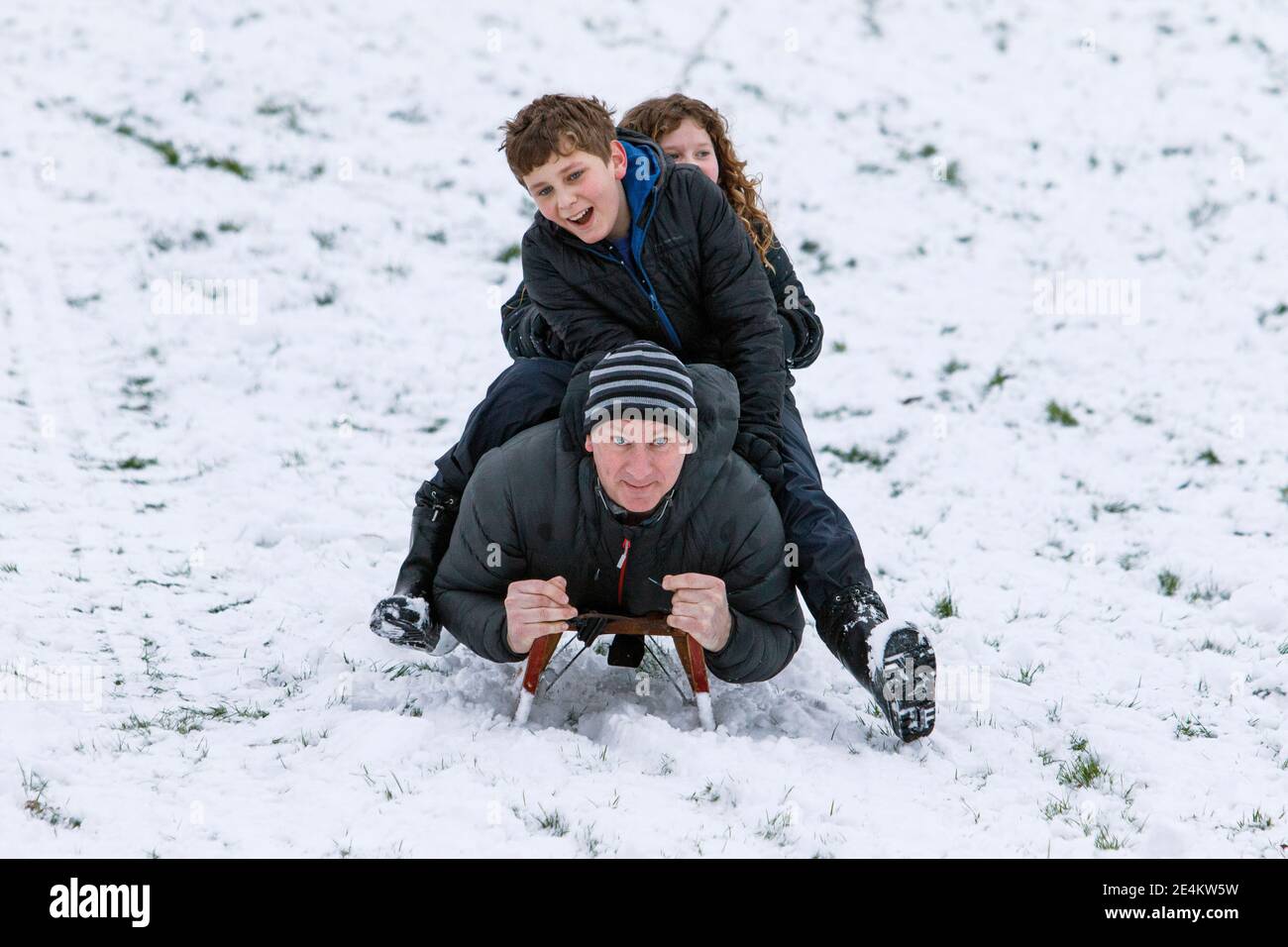 Children sledding hill hi-res stock photography and images - Alamy