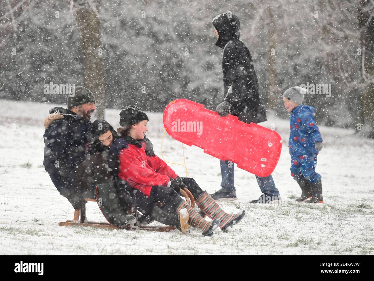 People sledging in a snowy Greenwich Park in London. Picture date ...