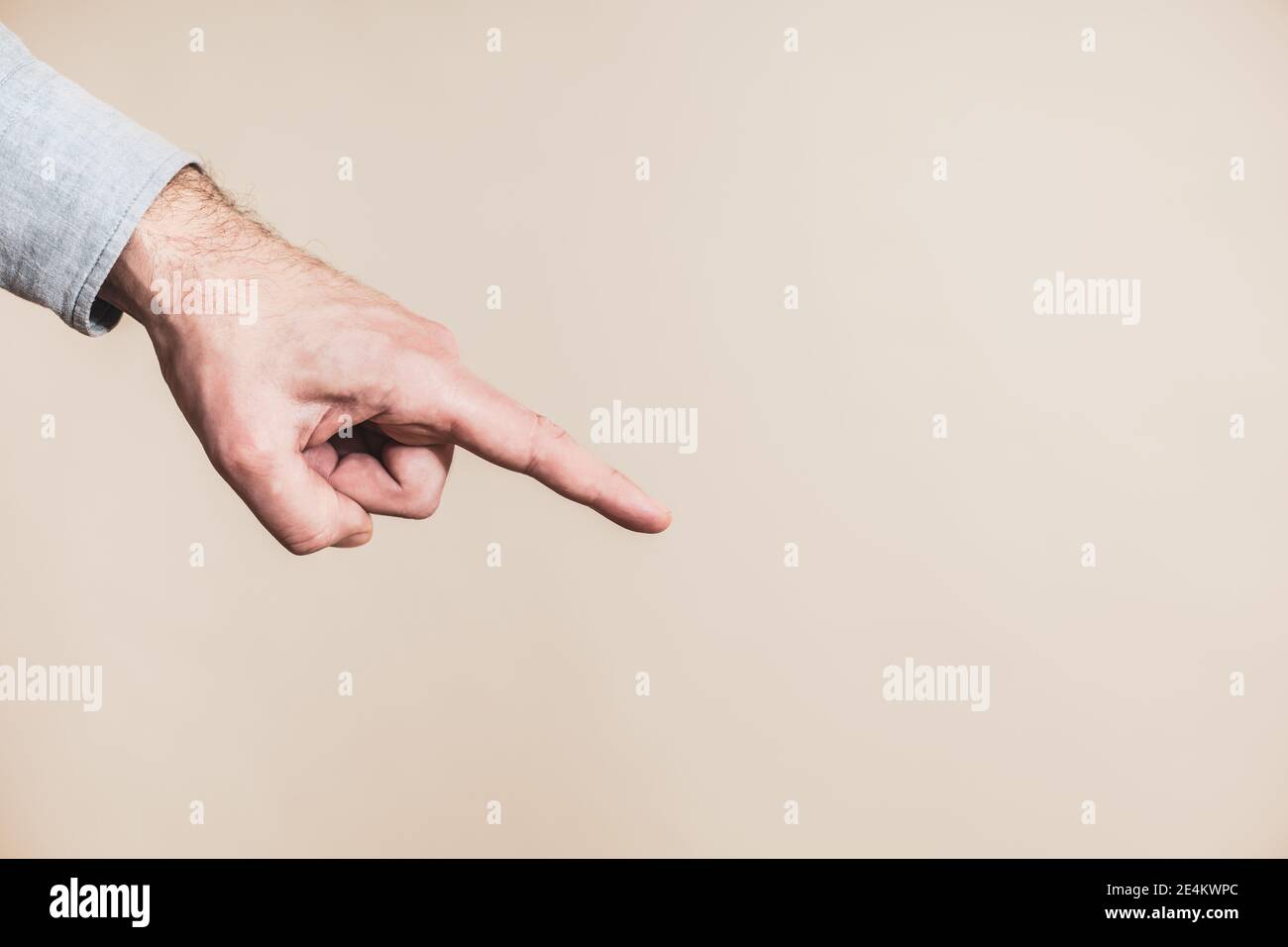 Hand pointing down touching hi-res stock photography and images - Alamy