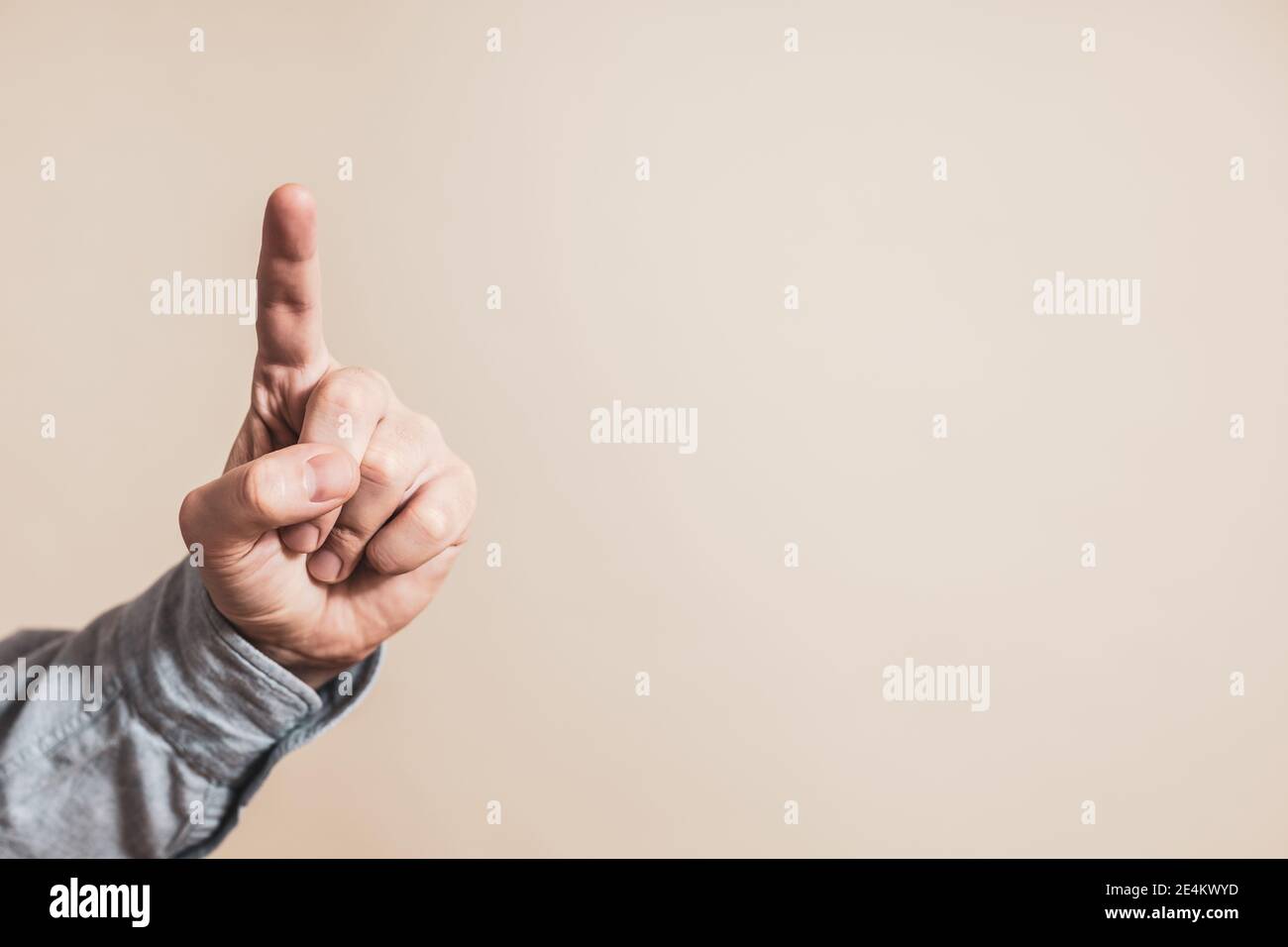 Close up image of male hand pointing Stock Photo - Alamy