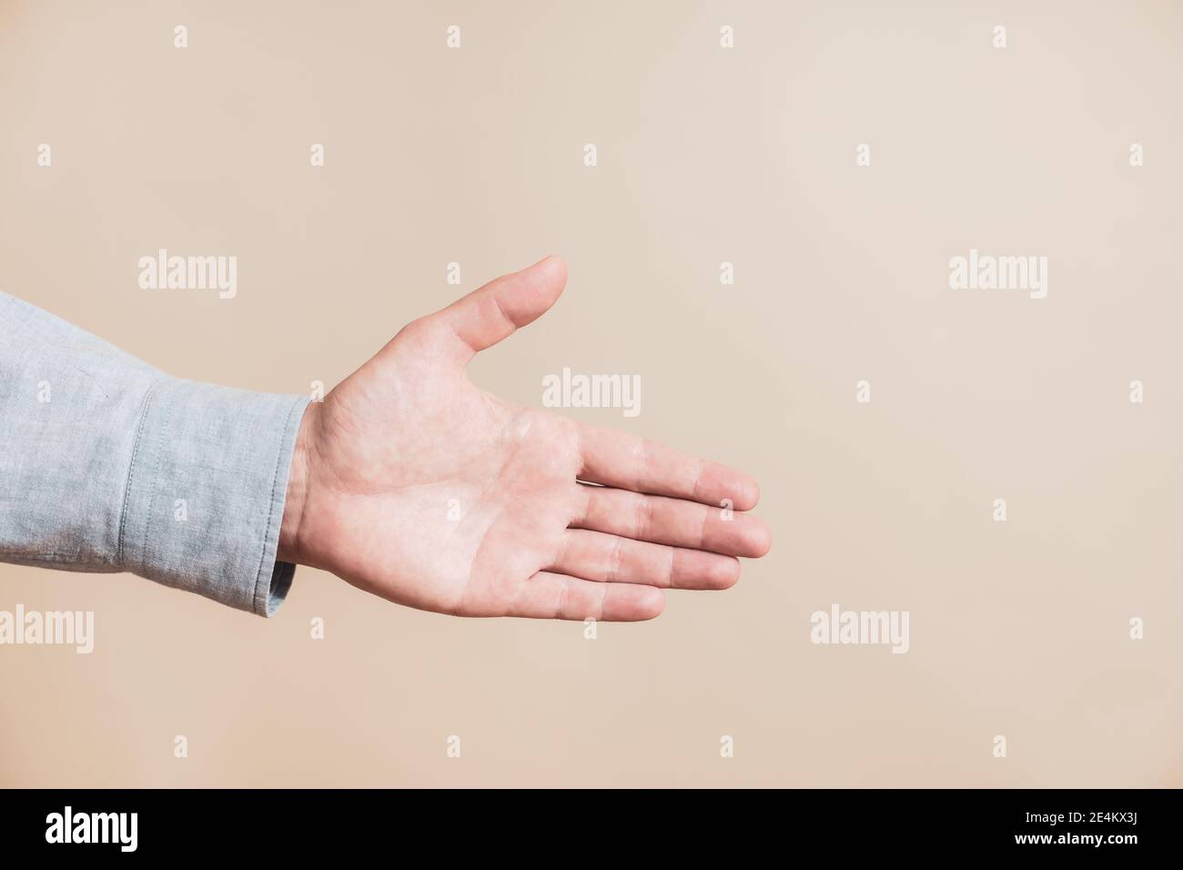 Close up image of male hand showing handshaking gesture Stock Photo - Alamy