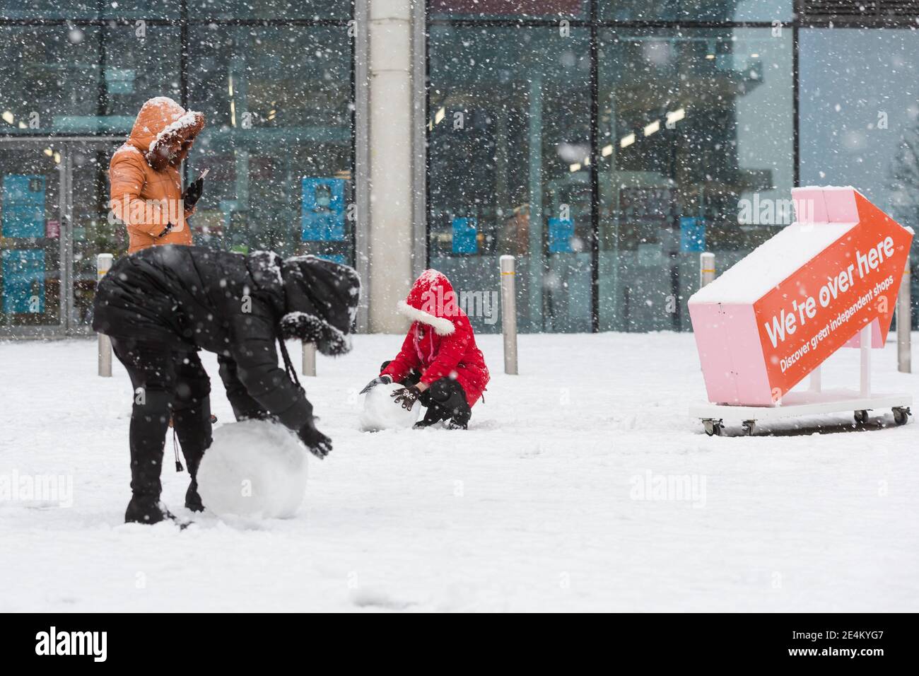 UK Weather, Wembley Park, UK. 24th January 2021.Children building ...
