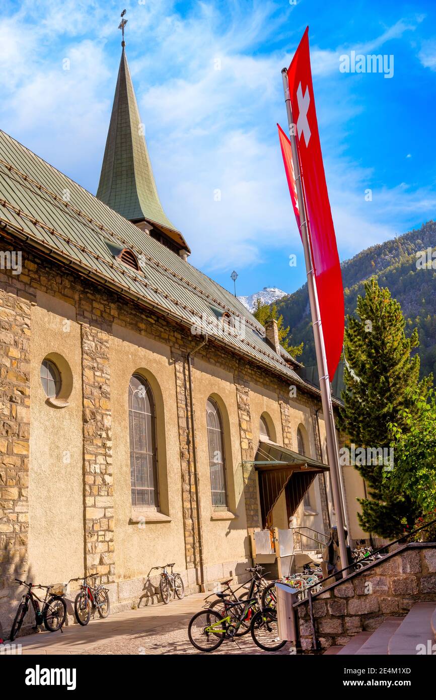 Zermatt, Switzerland town street view with St. Mauritius Church in ...