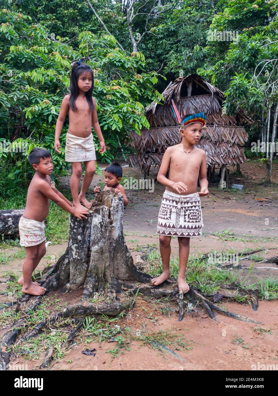 Iquitos, Peru- December 11 2019: Young Indian from Bora tribe in his ...