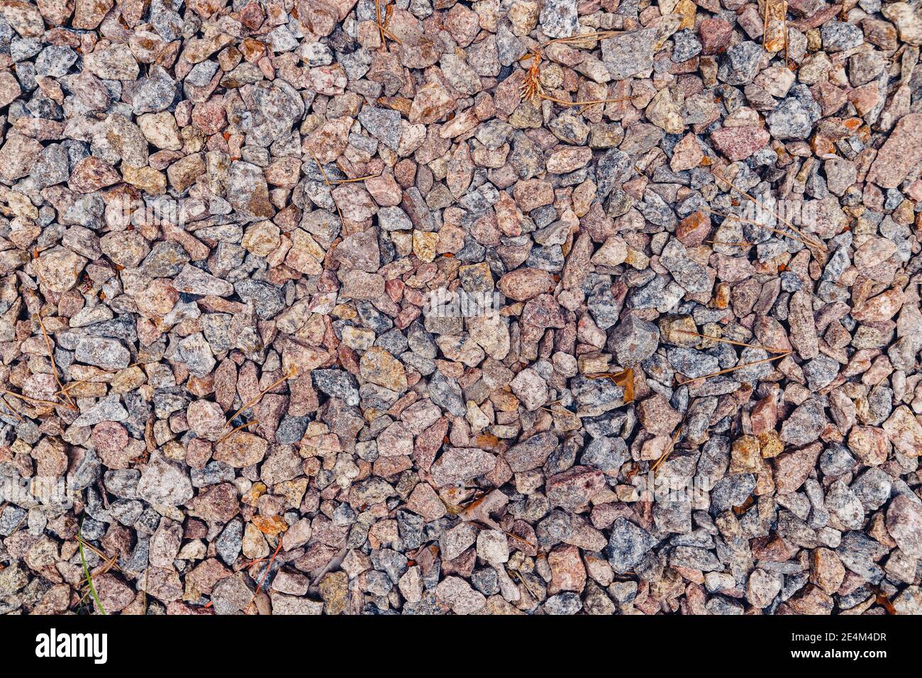 Background of natural grey granite crushed stone, macadam. Macro photo ...