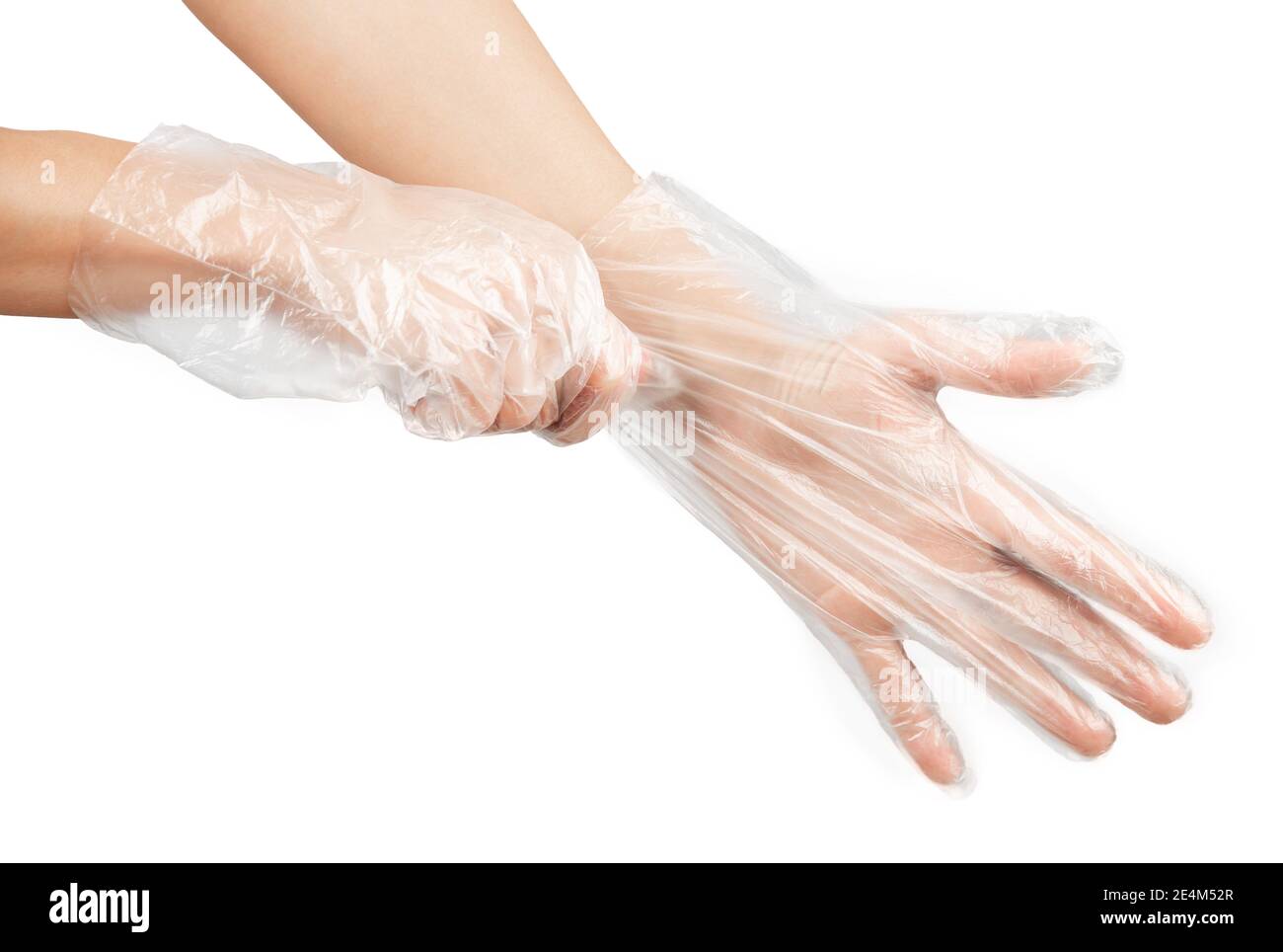 women's hands in transparent disposable gloves, isolate on a white ...