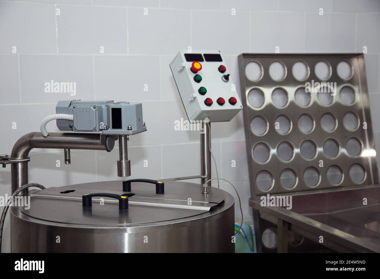 equipment of a private cheese factory and stages of preparation and ...