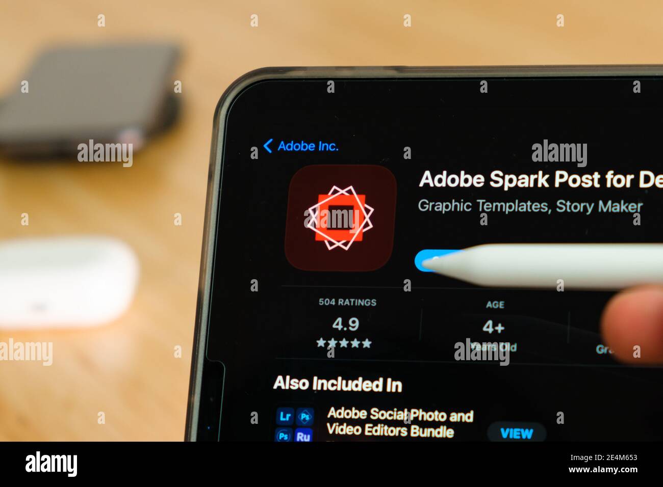 Adobe Spark logo shown by apple pencil on the iPad Pro tablet screen ...