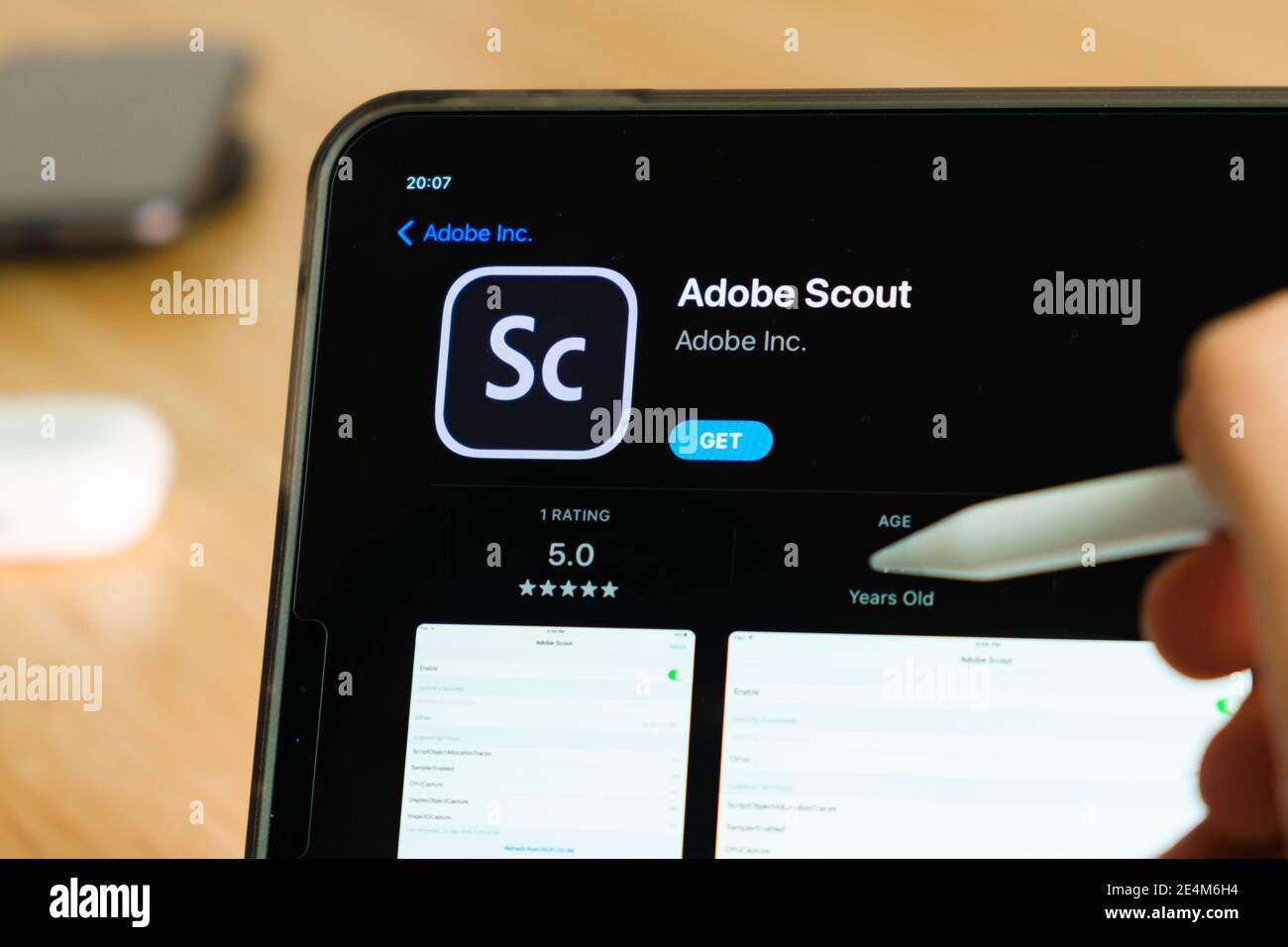 Adobe Scout logo shown by apple pencil on the iPad Pro tablet screen ...