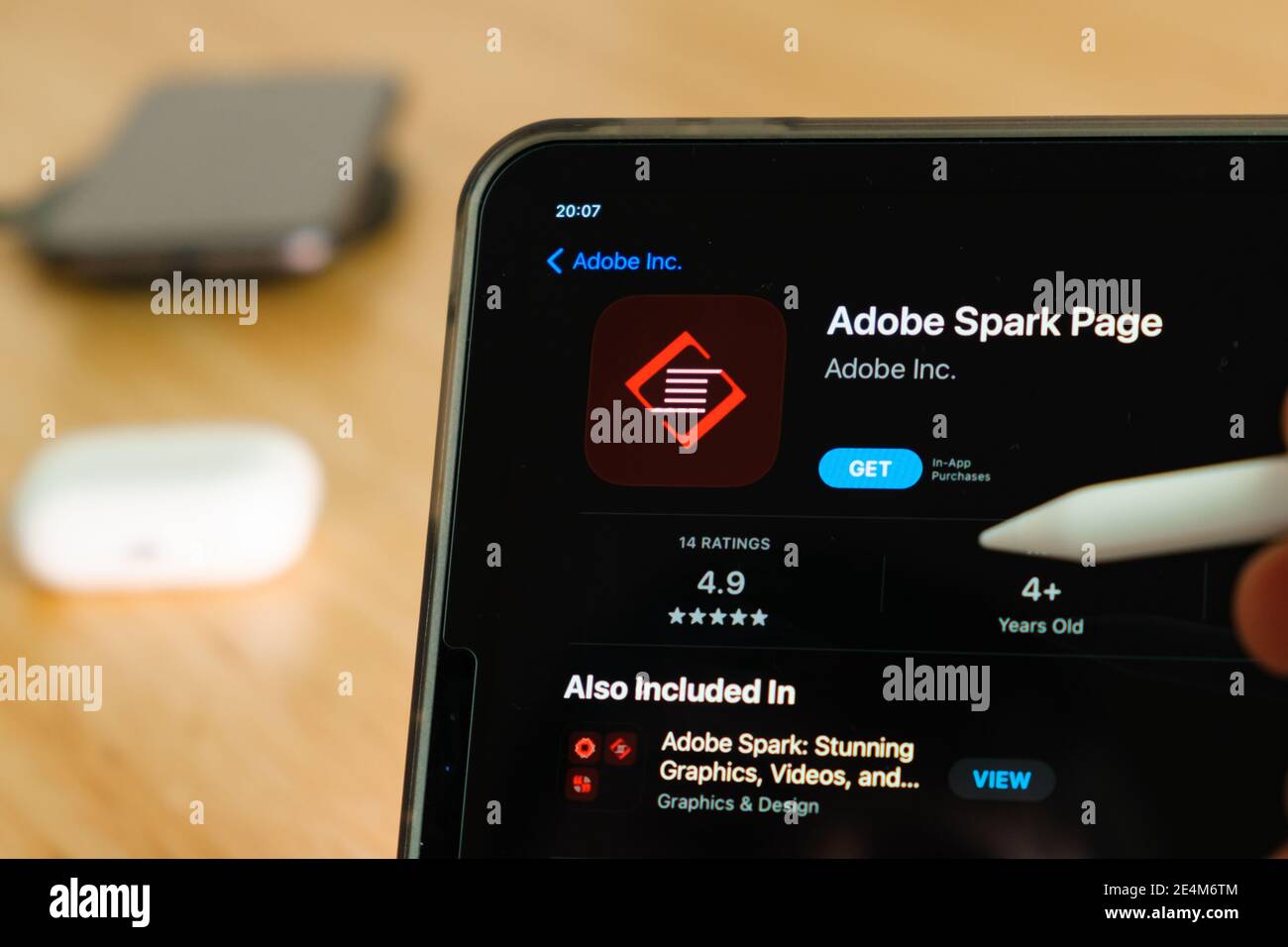 Adobe Spark logo shown by apple pencil on the iPad Pro tablet screen ...